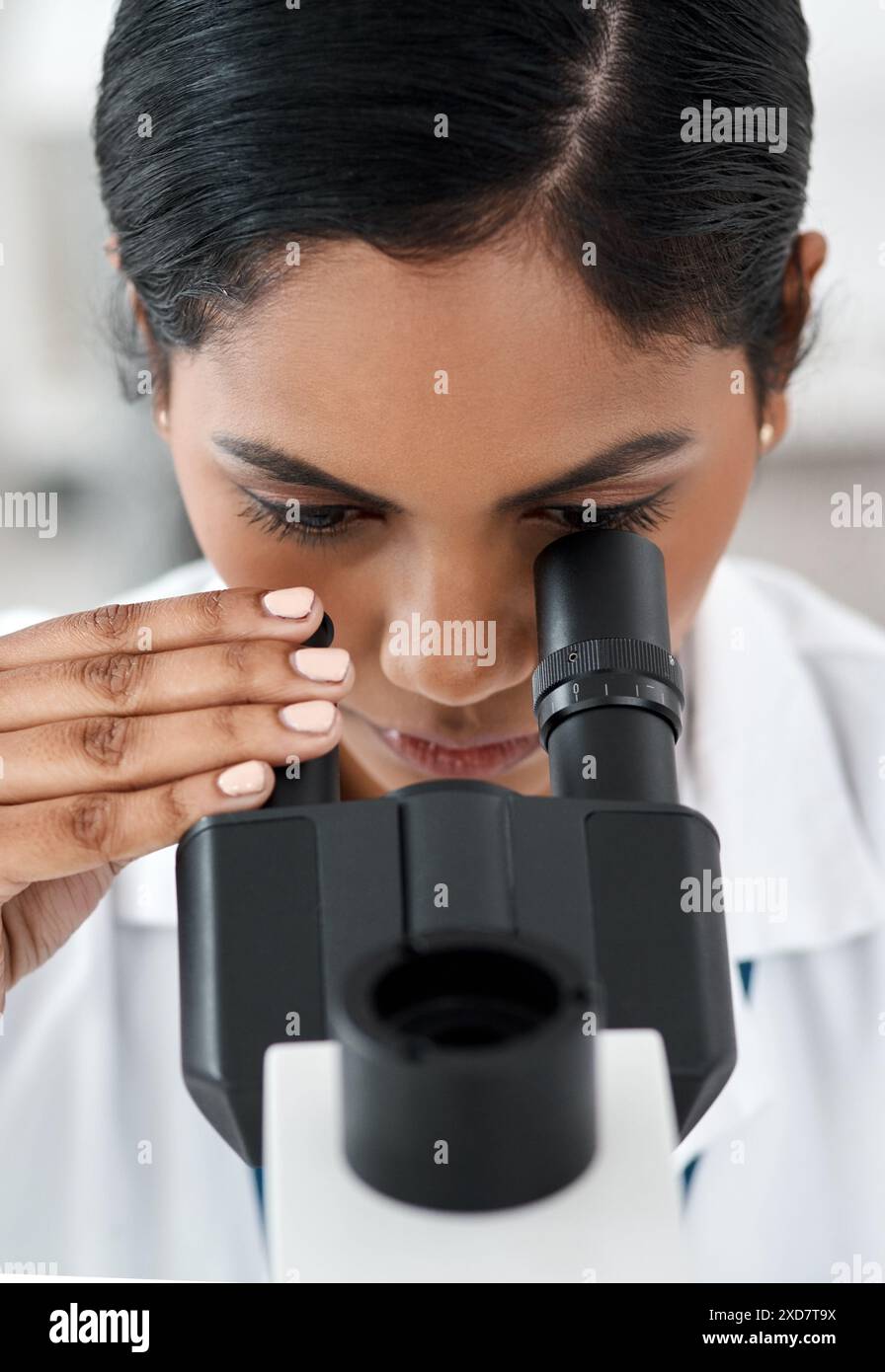 Scientist, microscope and observation in lab for science, innovation ...