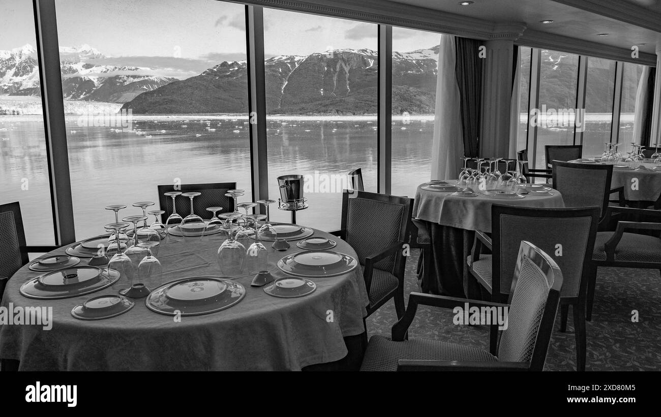 Empty restaurant seats interior by panoramic windows at scenic glacier ...