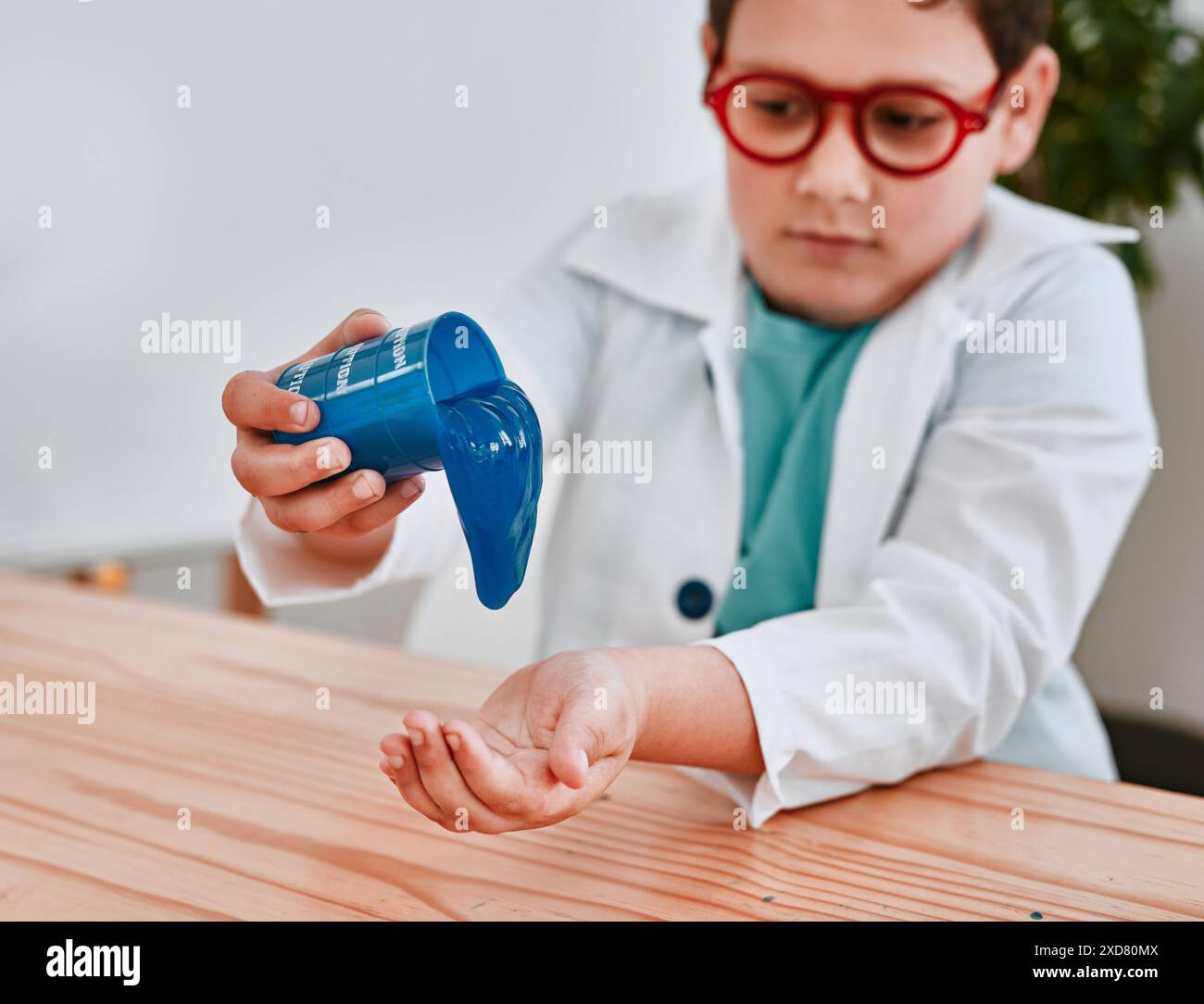 Boy, learning and slime at school for science, thinking and playful ...