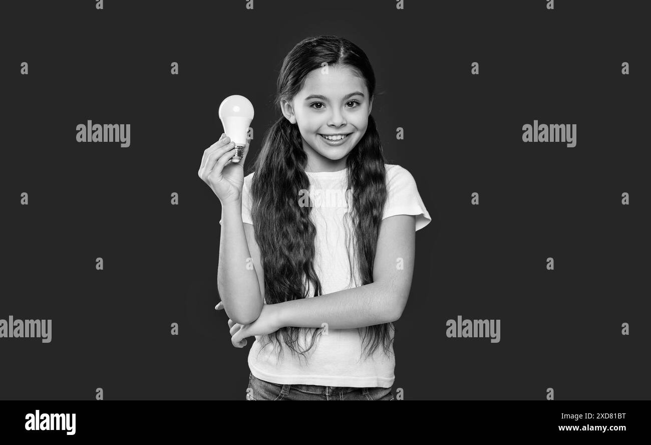 Girl lightbulb Black and White Stock Photos & Images - Alamy