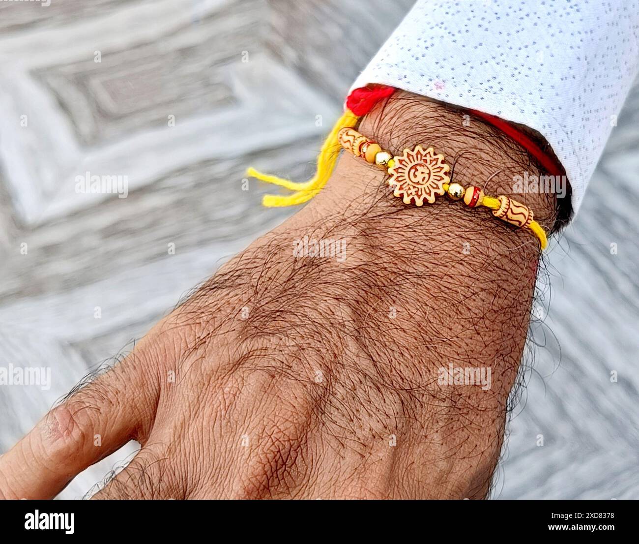 A Brother showing rakhi on his hand on an occasion of Raksha Bandhan ...