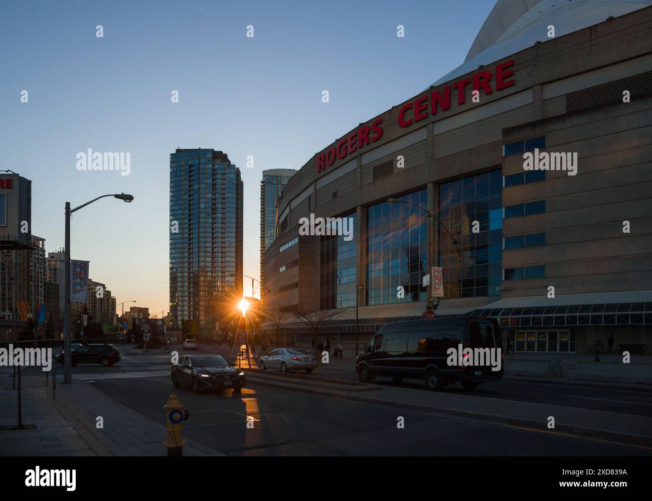 Rogers centre and CN tower at sunset time. Baseball stadium and new ...