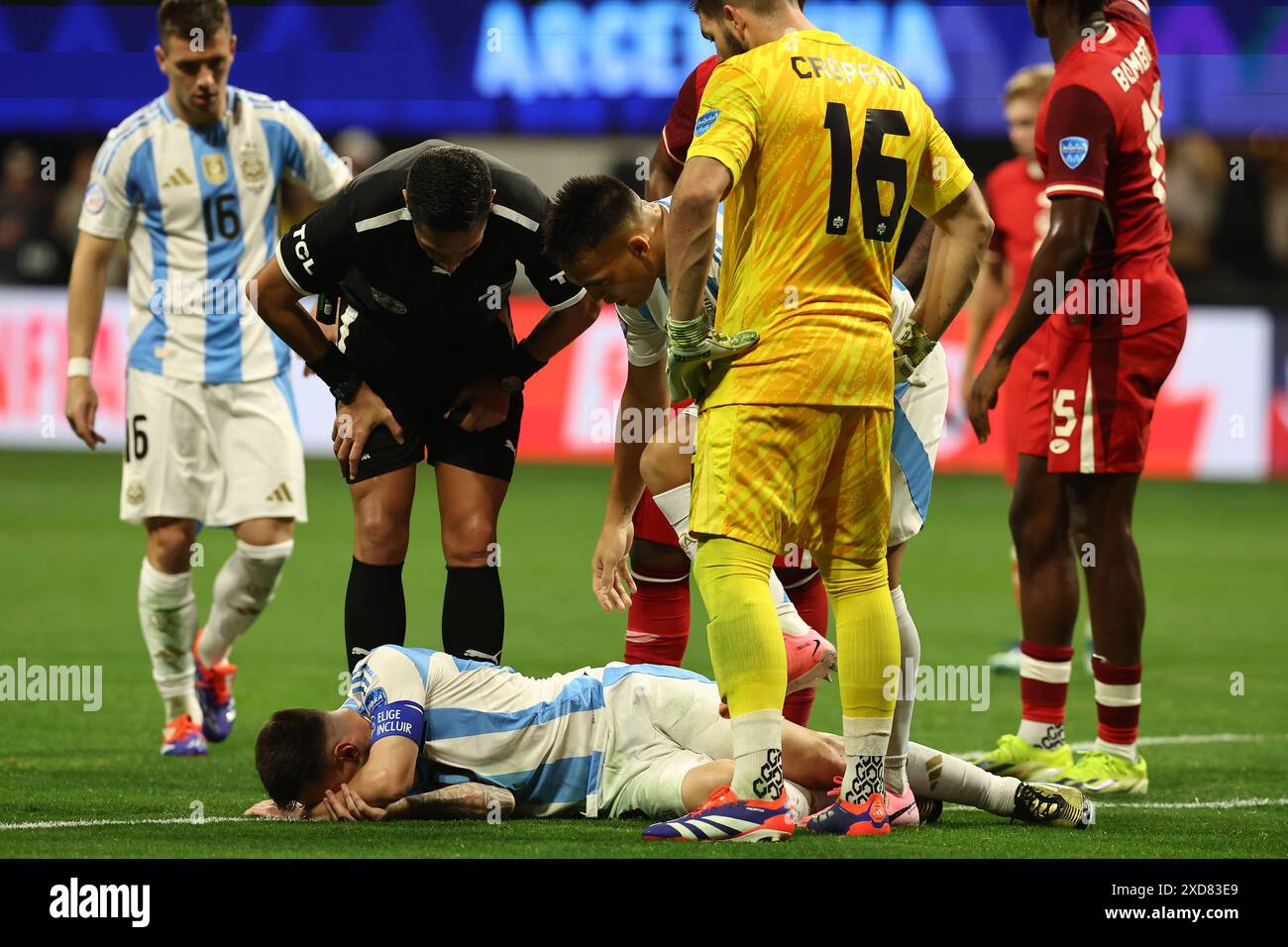 Argentina s forward Lionel Messi bottom gestures in pain during the ...