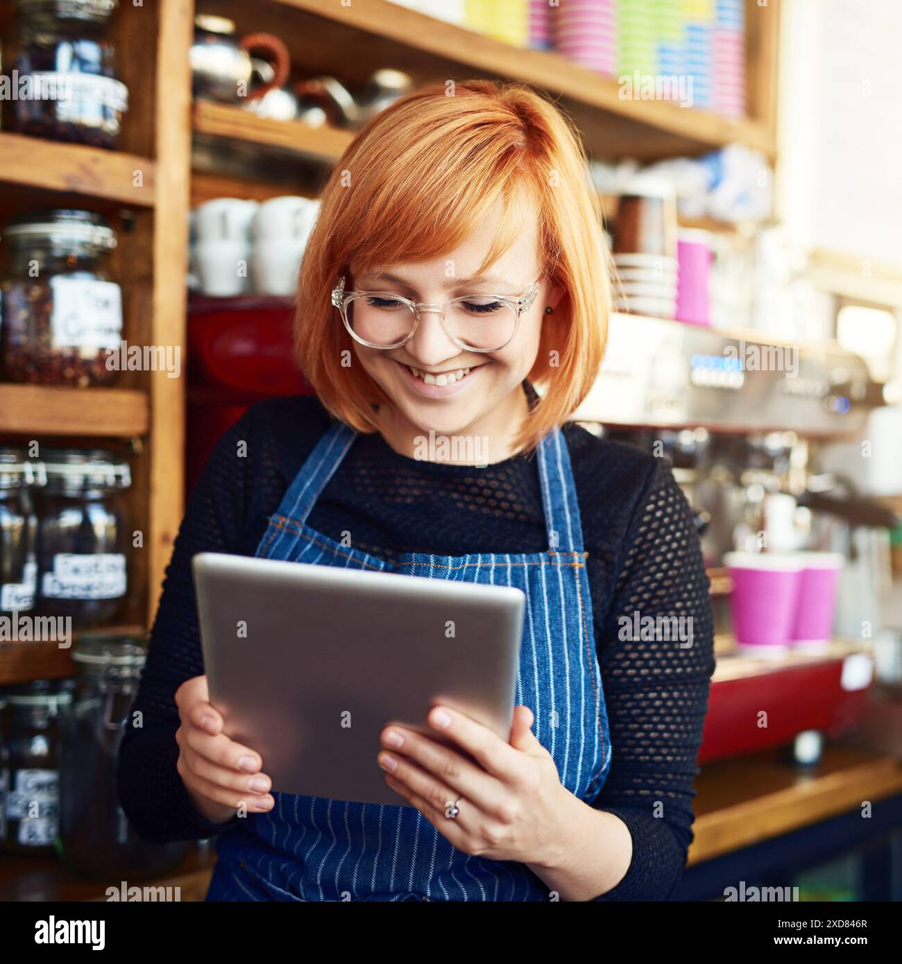 Barista, woman and tablet for startup cafe menu or online order on ...