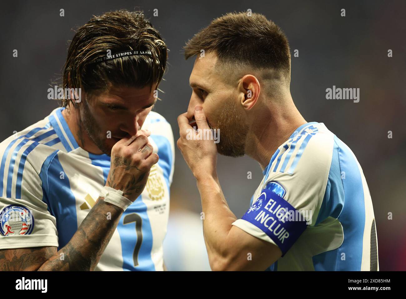 Argentina s forward Lionel Messi R chats with midfielder Rodrigo de ...