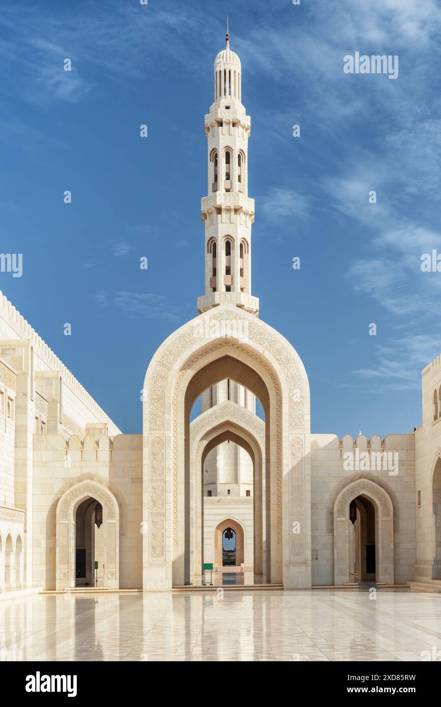 Beautiful white marble arches and minaret in courtyard of the Sultan ...