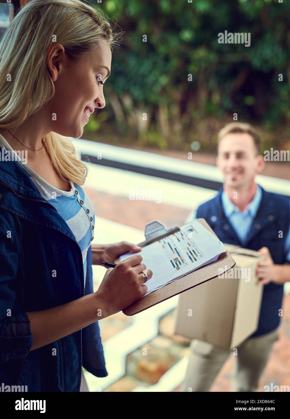 Delivery man, sign and outdoor with boxes, paperwork and transport of ...