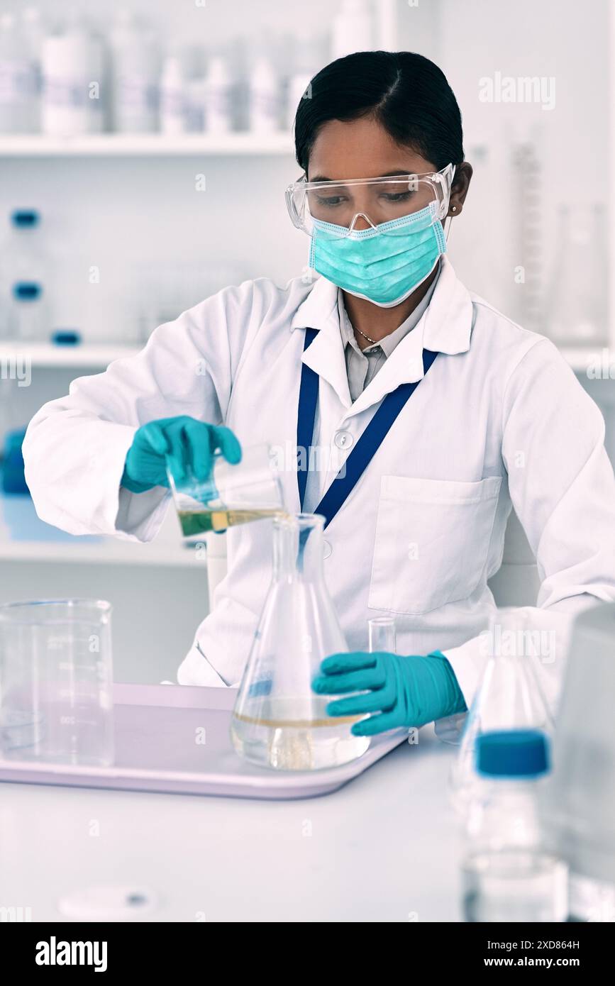 Laboratory, scientist or woman with beaker for chemical, liquid and ...