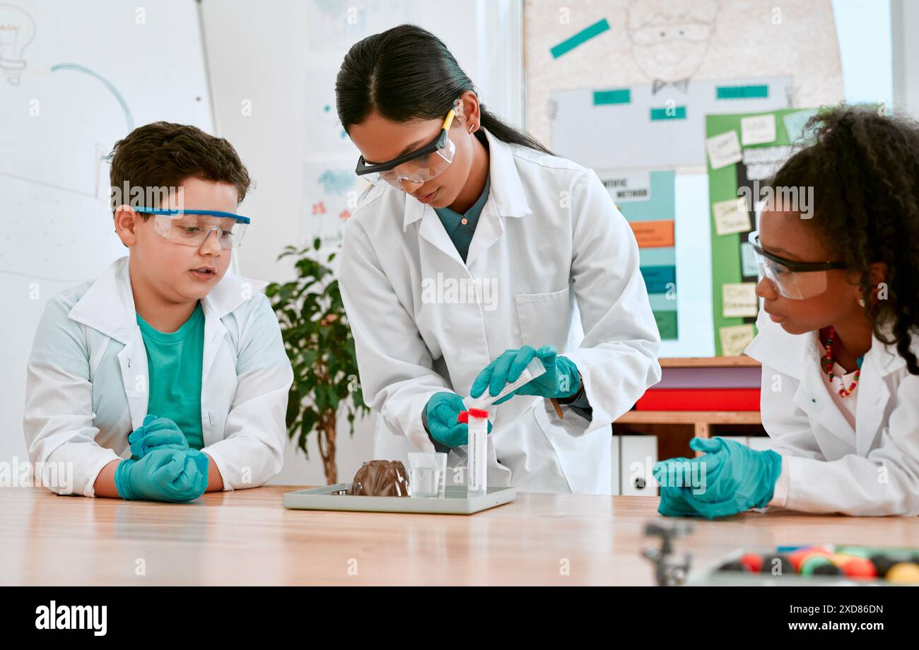 Experiment, students and teacher in classroom for science, education ...