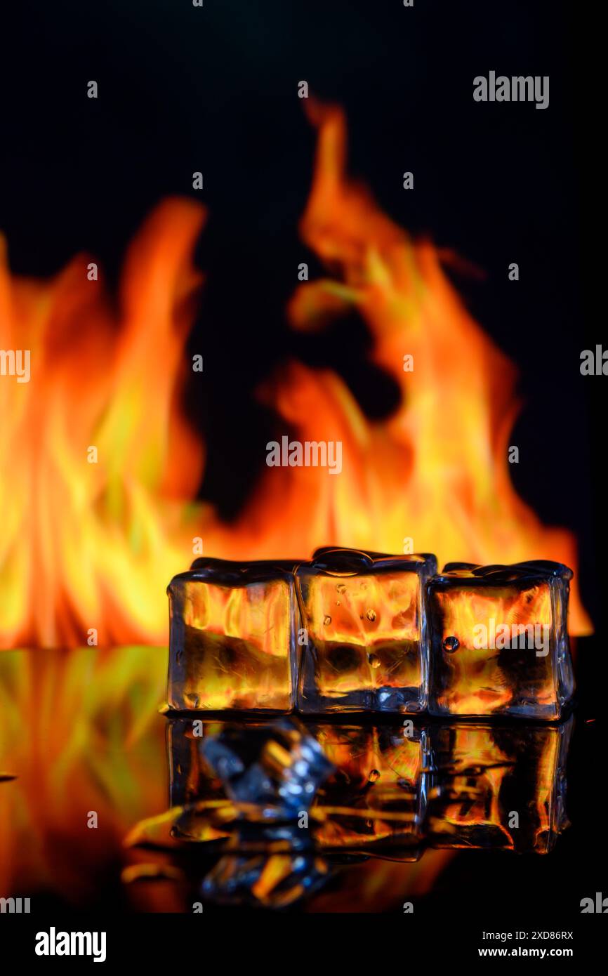 fire and ice cubes on a black background, place under the text 5 Stock ...