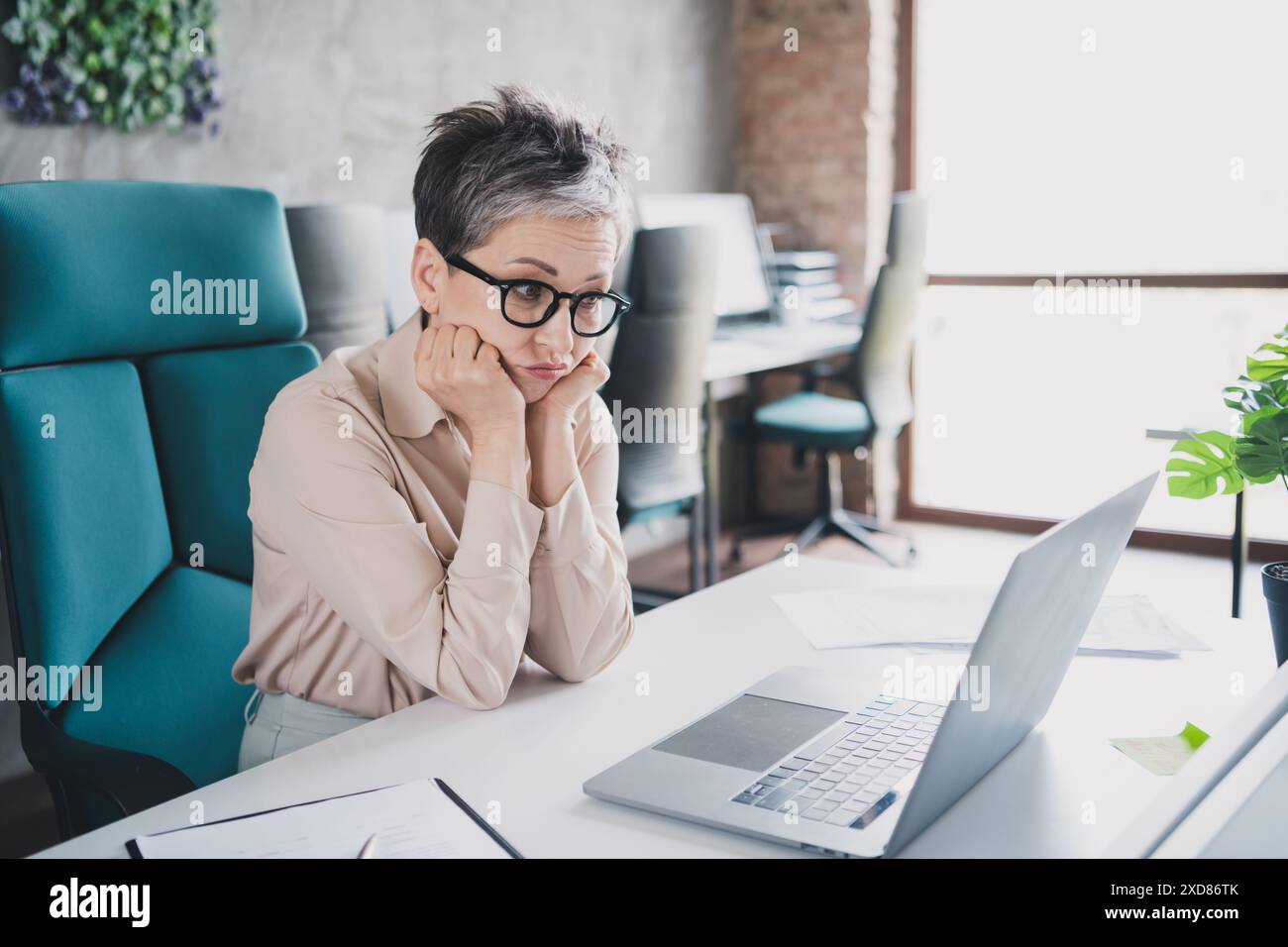 Photo of thoughtful charming senior lady assistant wear formal shirt ...