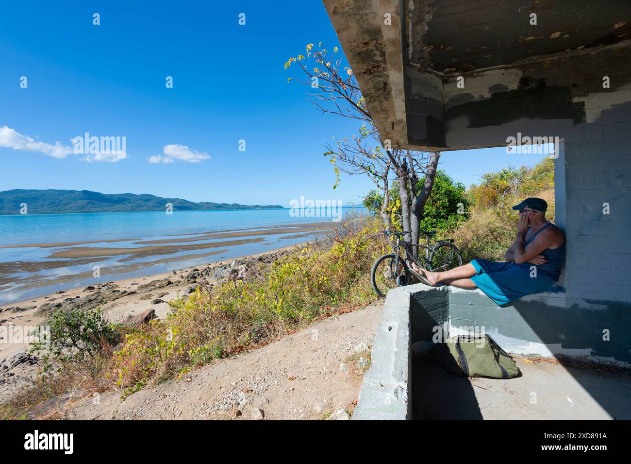 Cyclist enjoying the view at Cape Pallarenda Conservation Park ...