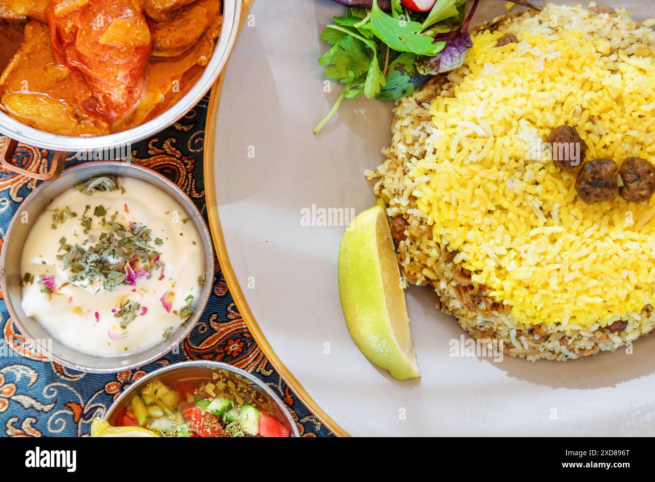 Top view of traditional Iranian dishes and snacks. Polow, kufte, fresh ...