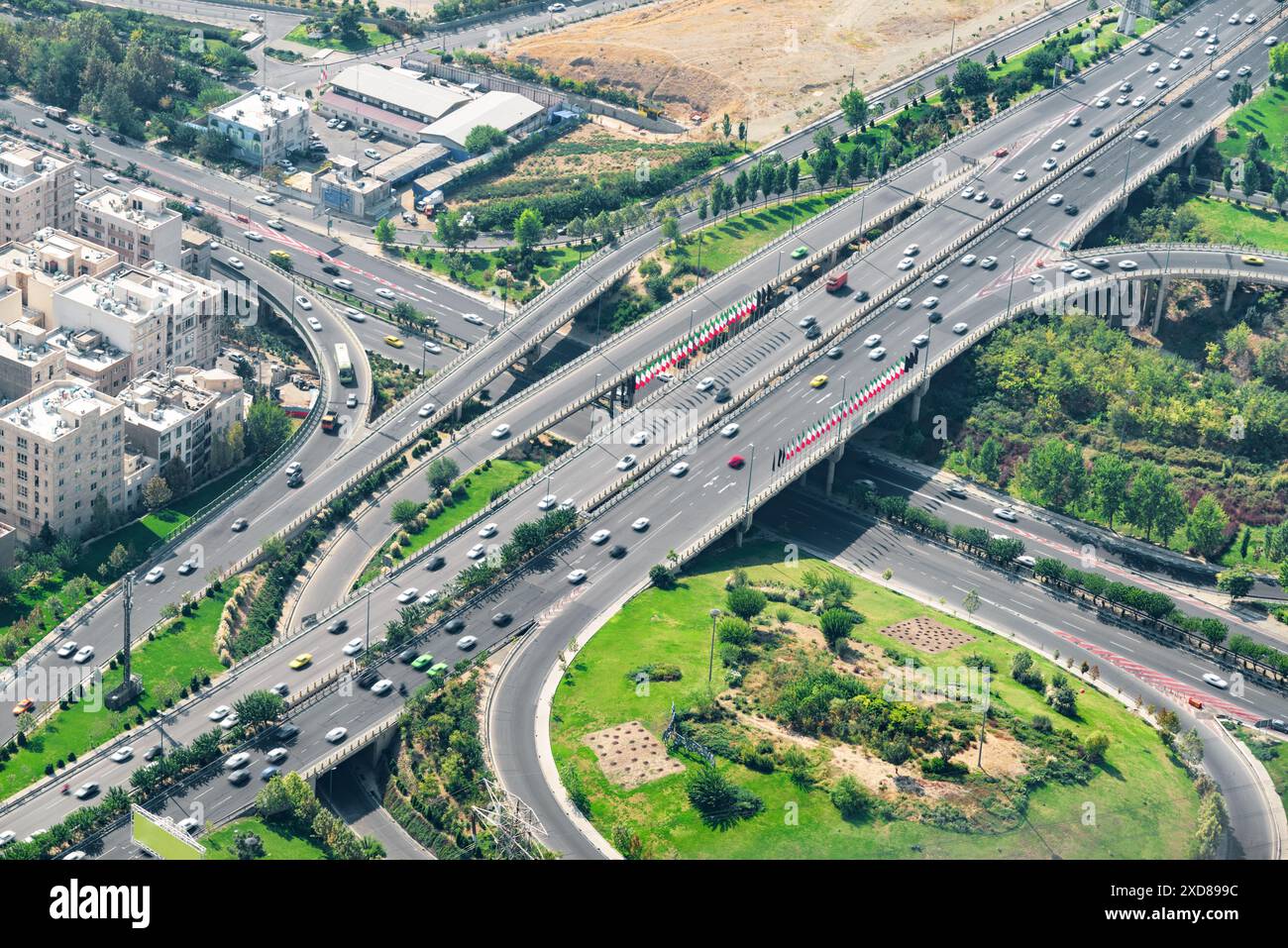Aerial view of two-level road junction in Tehran, Iran. Day traffic of ...