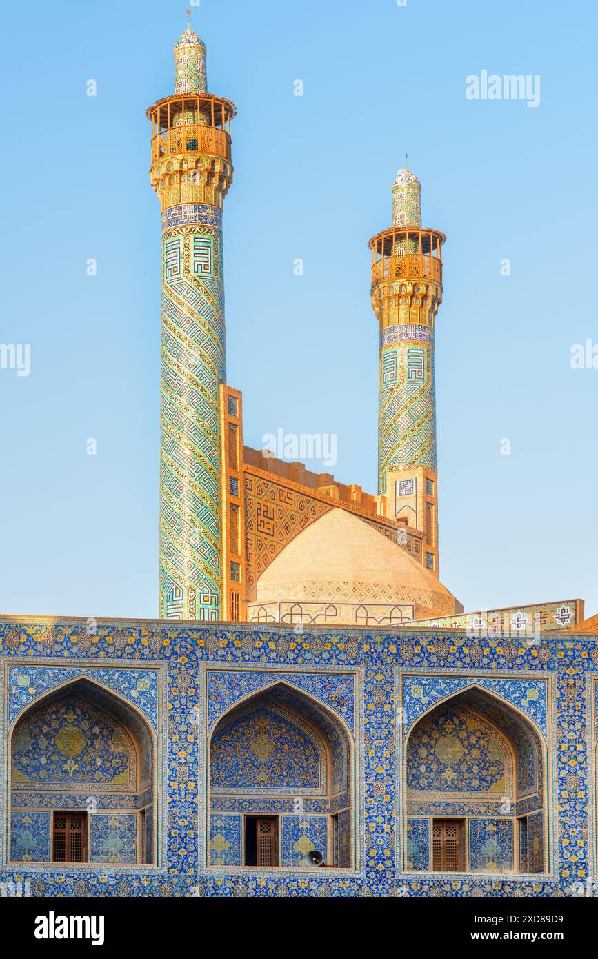 Gorgeous view of awesome minarets covered with colorful mosaic tiles at ...