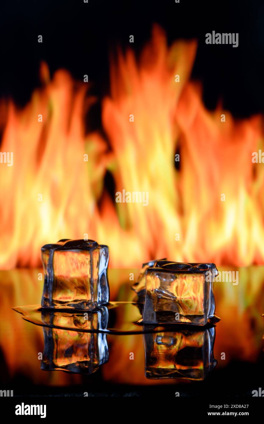 fire and ice cubes on a black background, place under the text 4 Stock ...