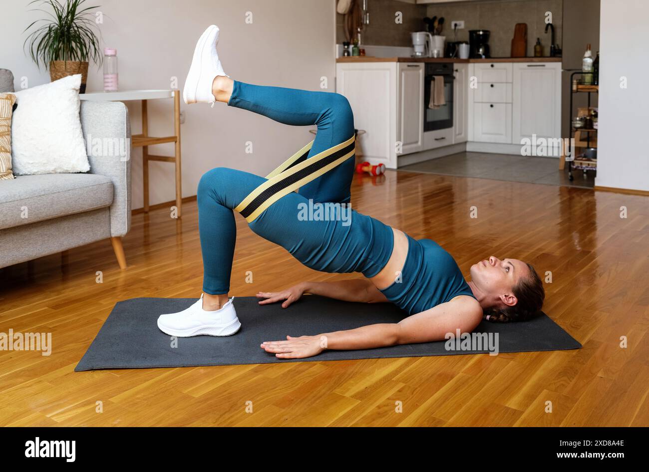 Woman using mini band hi-res stock photography and images - Alamy