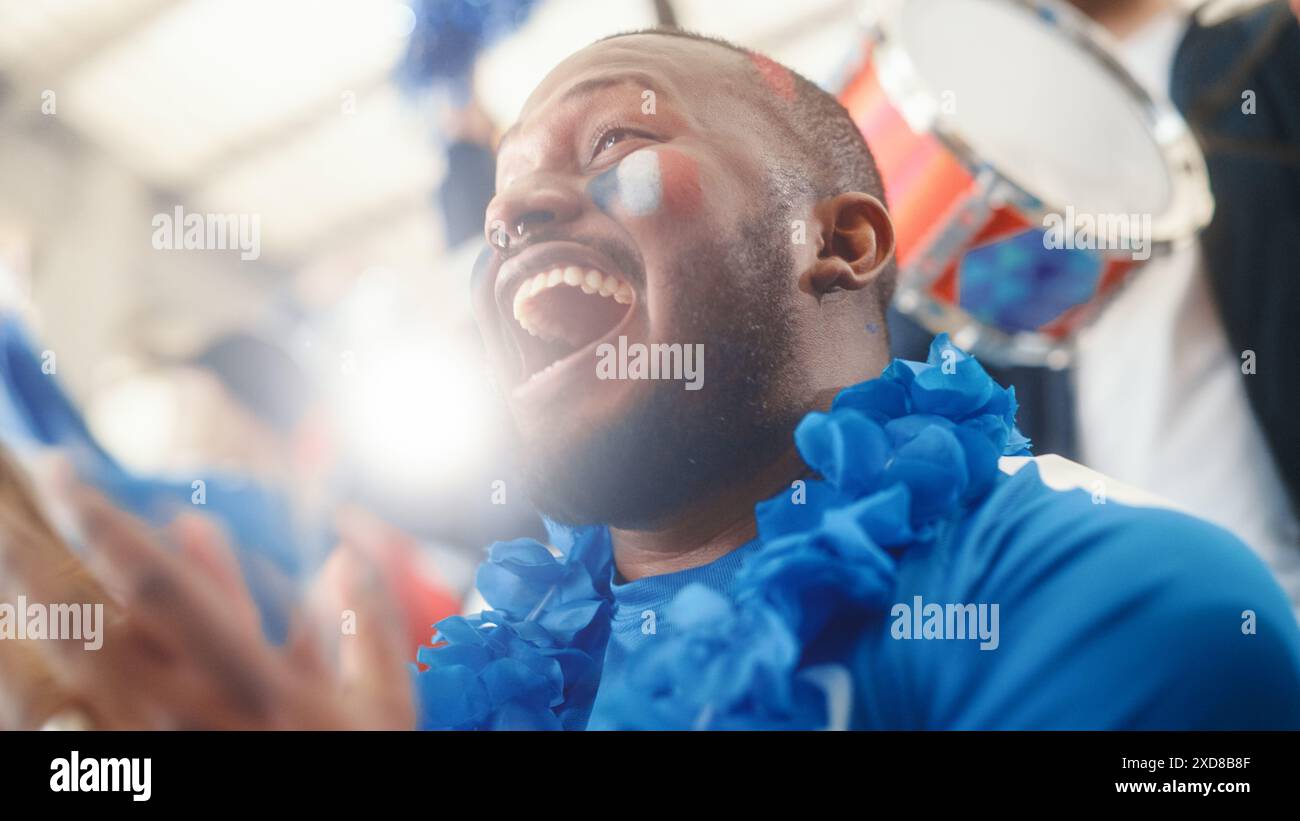 Sport Stadium Big Event: Handsome Black Man Cheering. Crowd of Fans ...