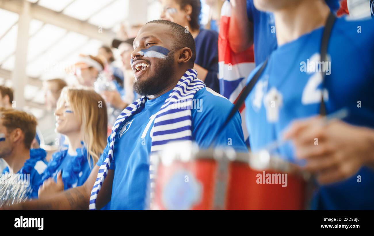 Sport Stadium Big Event: Handsome Black Man Cheering. Crowd of Fans ...