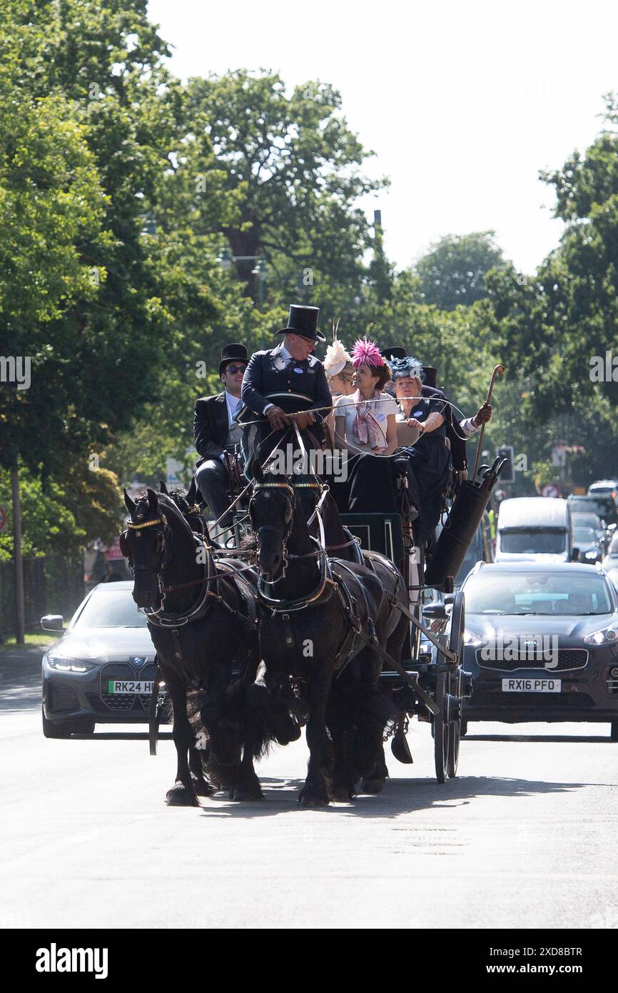 Ascot, UK. 20th June, 2024. A carriage takes Royal Ascot racegoers ...