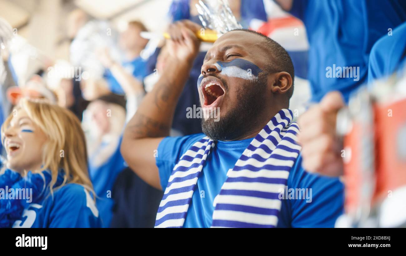 Sport Stadium Big Event: Handsome Black Man Cheering. Crowd of Fans ...