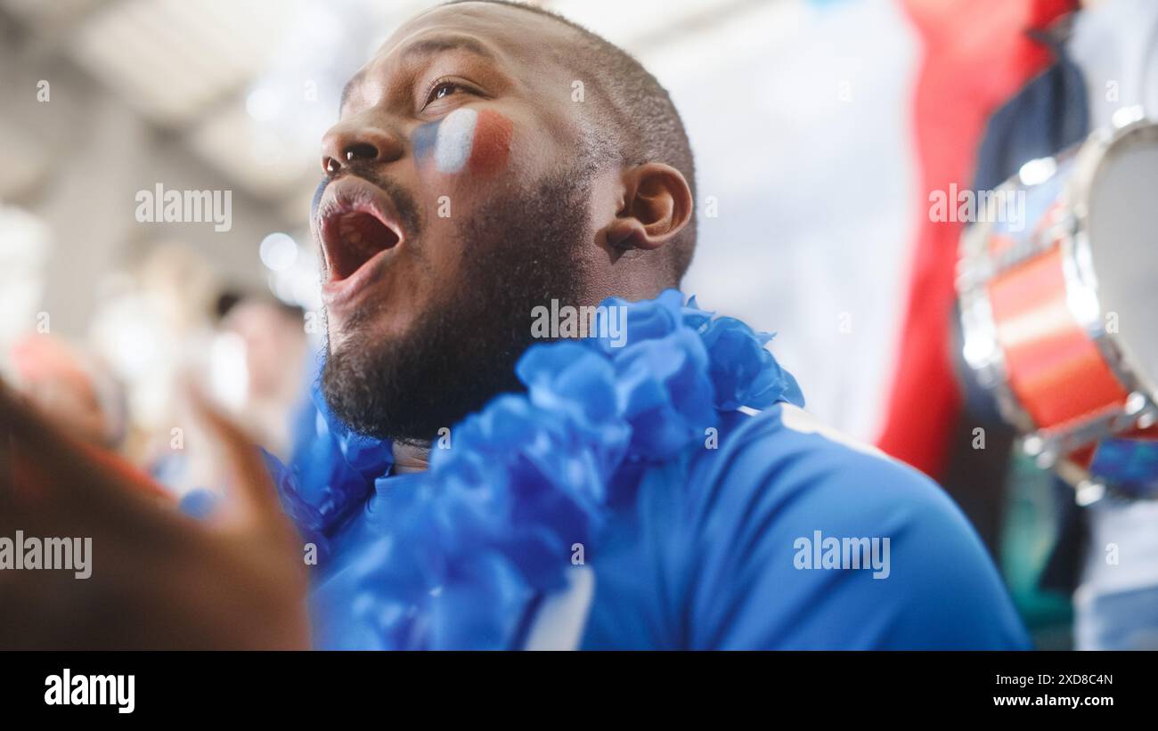 Sport Stadium Big Event: Handsome Black Man Cheering. Crowd of Fans ...