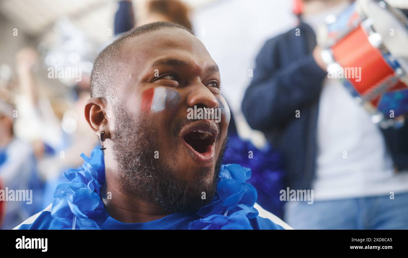 Sport Stadium Big Event: Handsome Black Man Cheering. Crowd of Fans ...