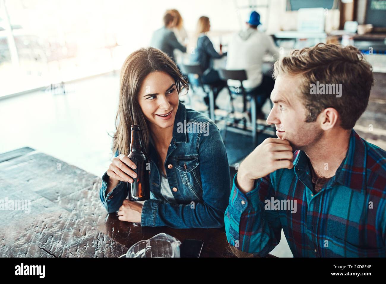 Date, couple and restaurant with drink, flirt and happy for romance and ...