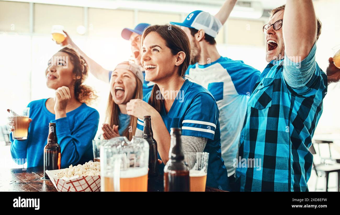 Friends, excited and watching tv at sport pub with game, goal and beer ...