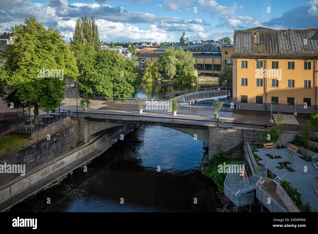 Aerial view of Gamlebro bridge across Motala Stream during a sunny ...