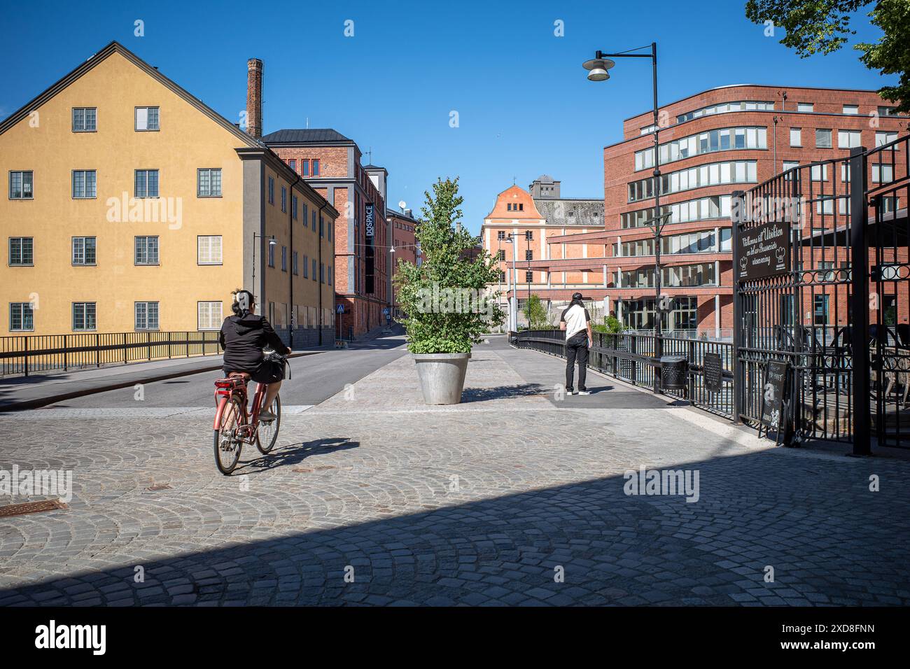 Urban scene from Gamlebro bridge during a summer morning in Norrköping ...