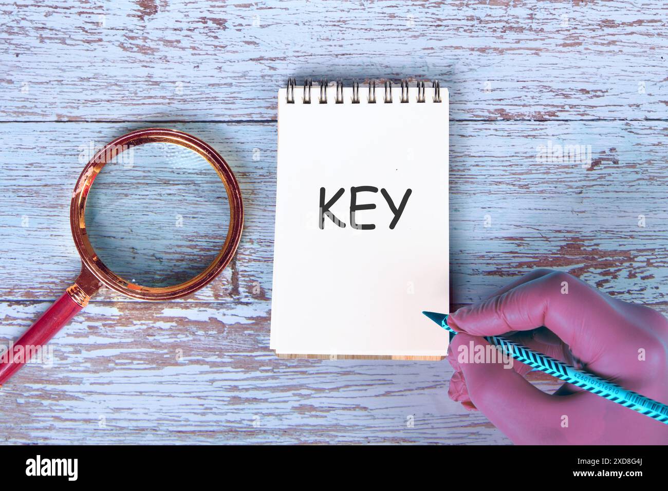 The text KEY It is written in the notebook by hand Stock Photo - Alamy