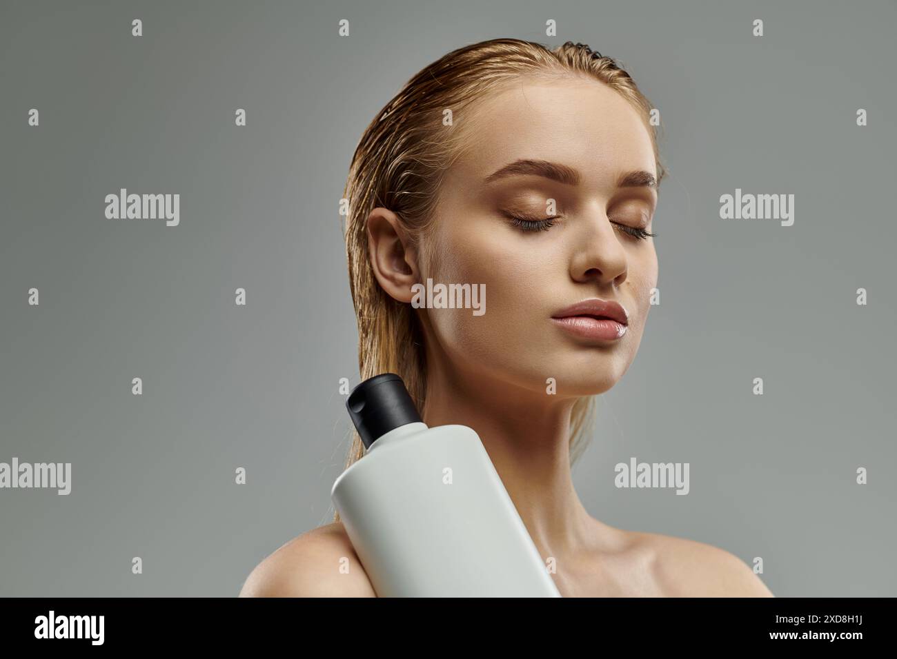 Woman holds hair care hi-res stock photography and images - Alamy