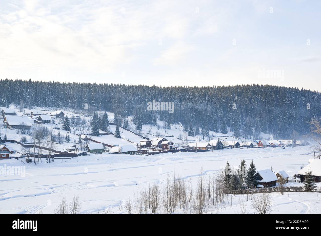 Snowy rural landscape trees houses hi-res stock photography and images ...