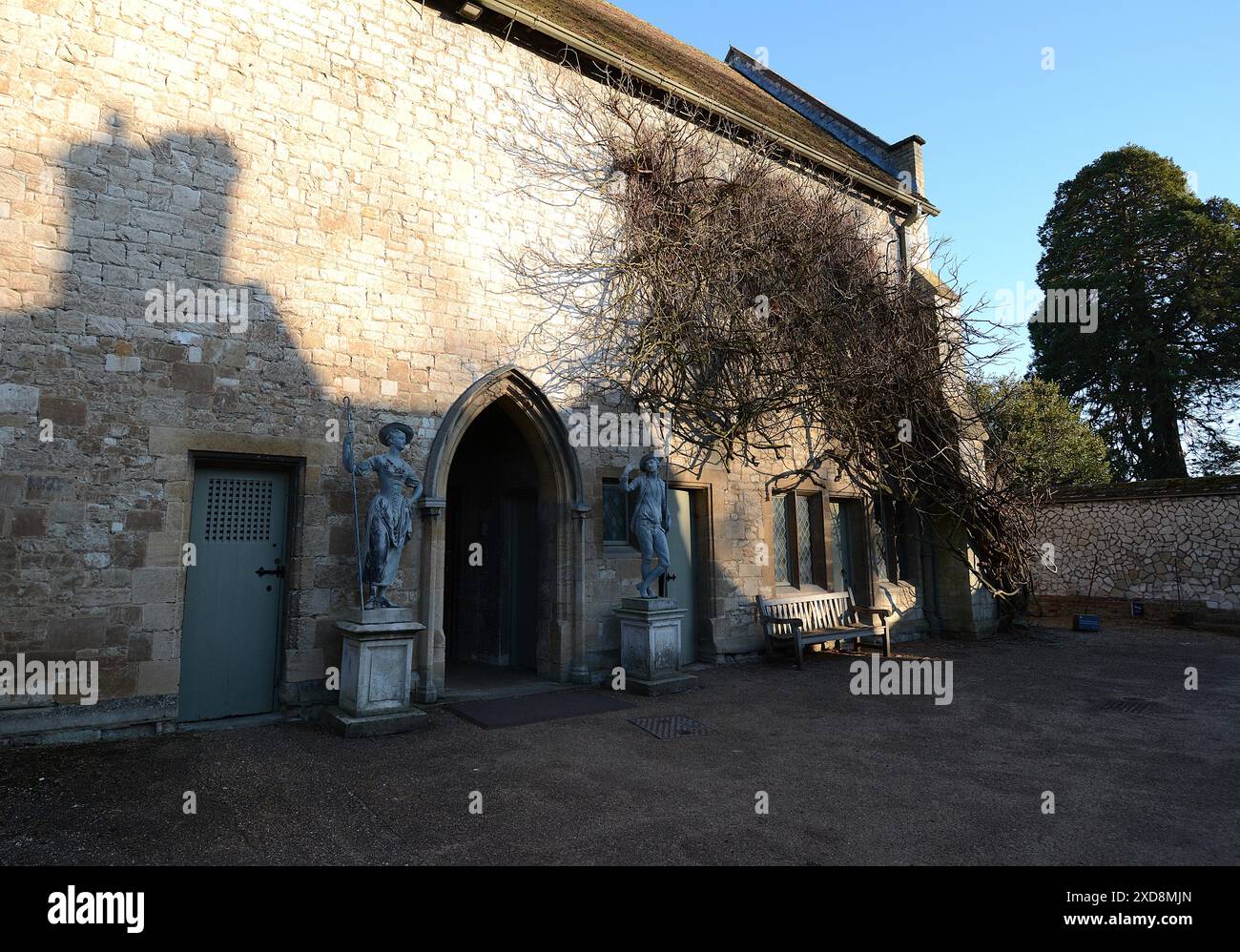 House National trust arch arches stone building house home front door ...
