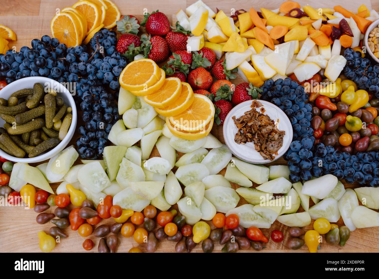 Colorful grazing board with fresh fruits, vegetables, and pickles Stock ...