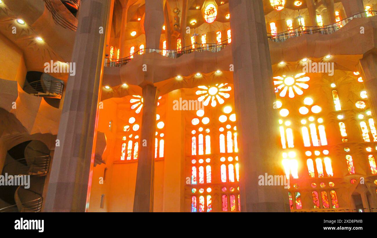 Stained glass casting light inside La Sagrada Familia in Barcelona ...