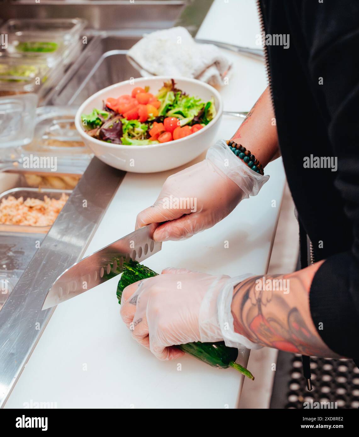 chef preparing salad restaurant luxury miami Stock Photo - Alamy