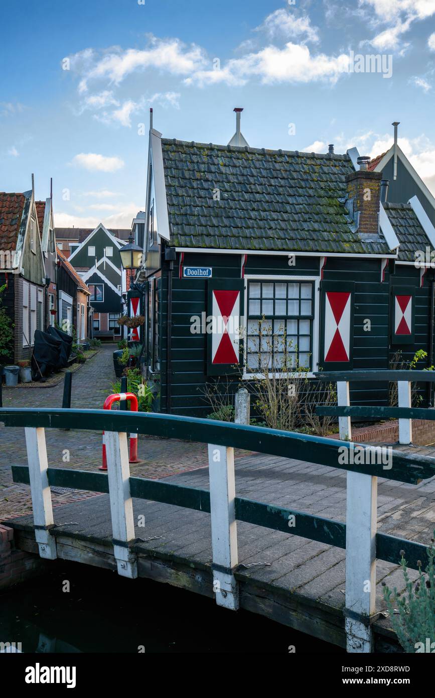 Volendam street with traditional dutch houses and a canal Stock Photo ...