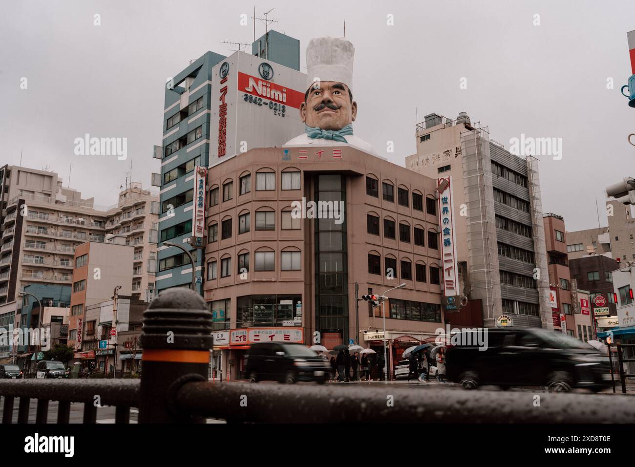 Iconic Chef Niimi Statue on Rainy Day Stock Photo - Alamy