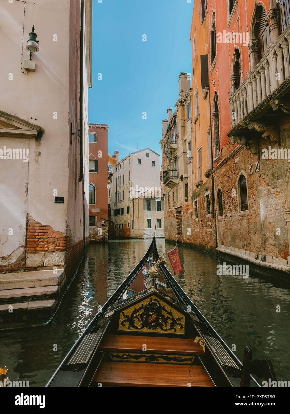 Gondola ride on narrow canal in Venice, Italy shot from inside boat ...