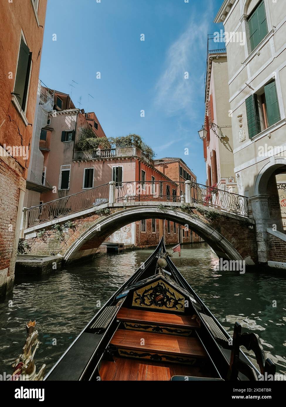 Gondola ride on narrow canal in Venice, Italy shot from inside boat ...