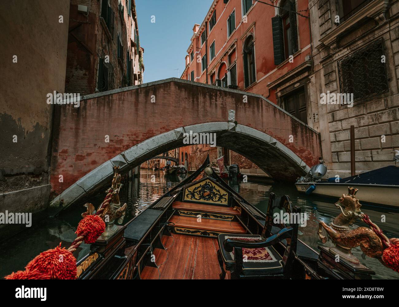 Gondola ride on narrow canal in Venice, Italy shot from inside boat ...