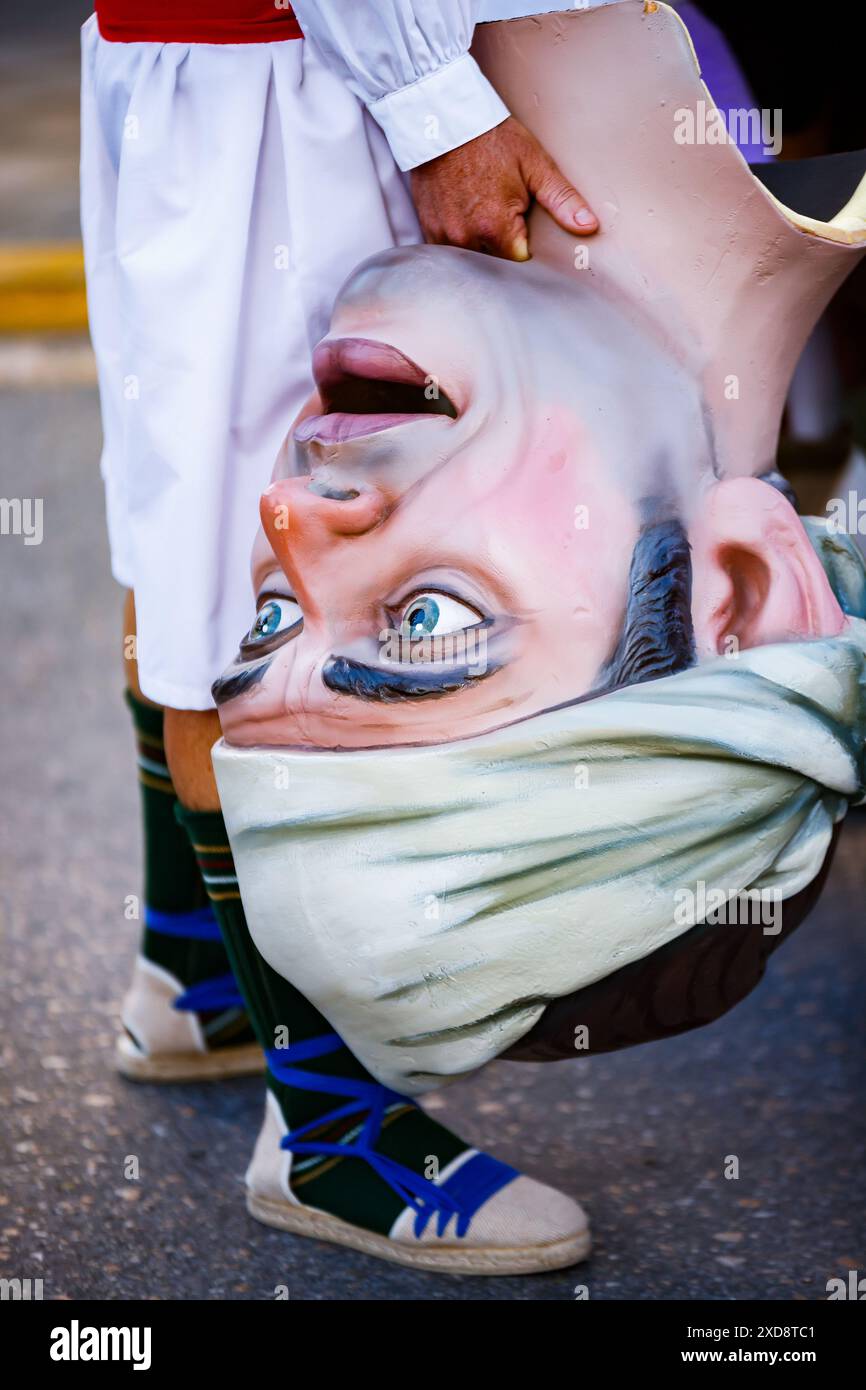 Hand holding the big-headed man in the Corpus Christi procession Stock ...