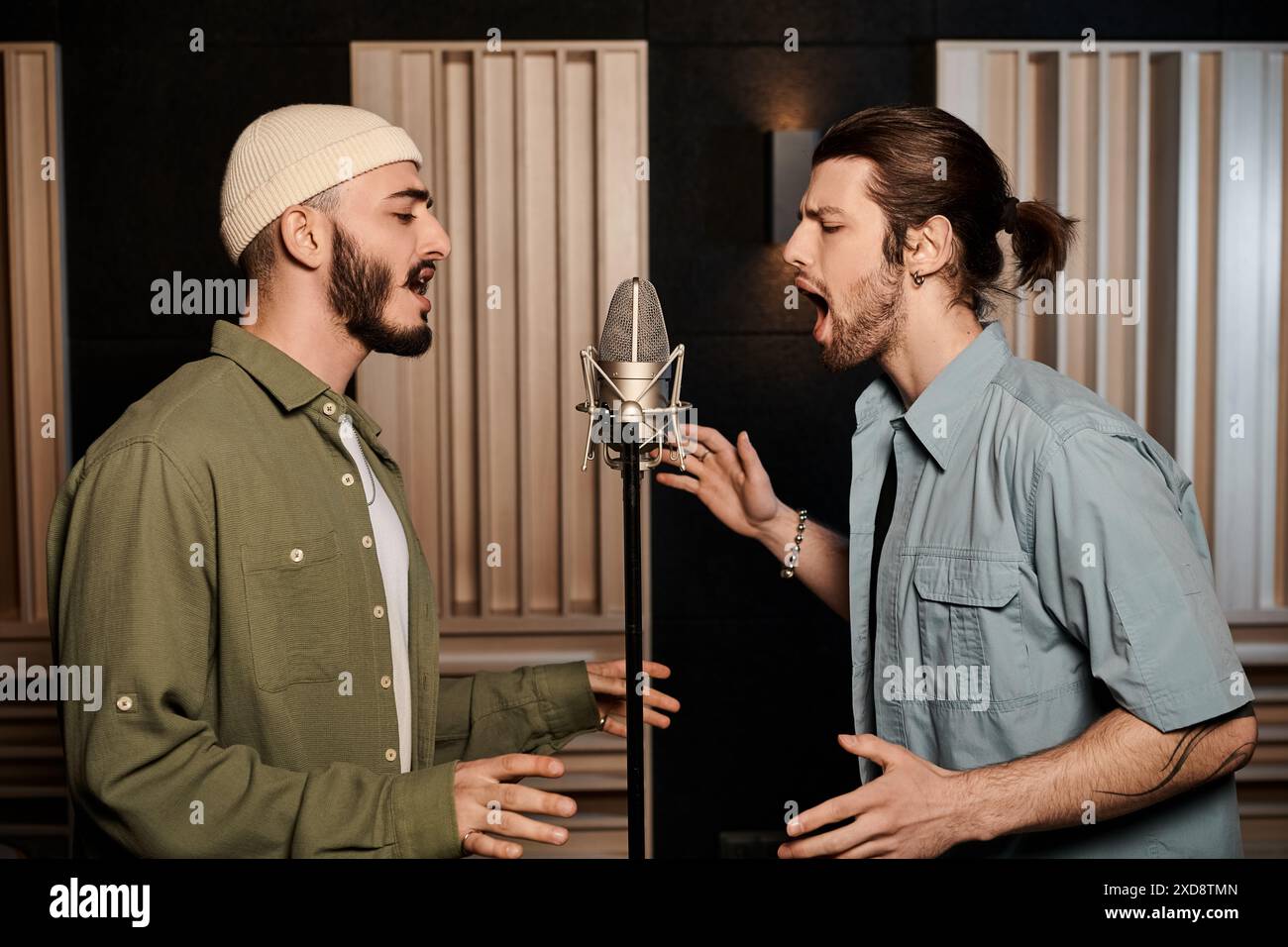 Two men passionately sing into a microphone in a recording studio, lost ...