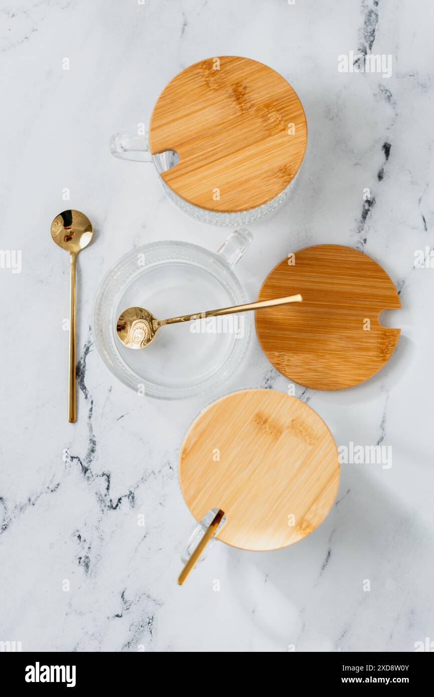 Bird's eye view of tabletop with bowls and spoons Stock Photo - Alamy