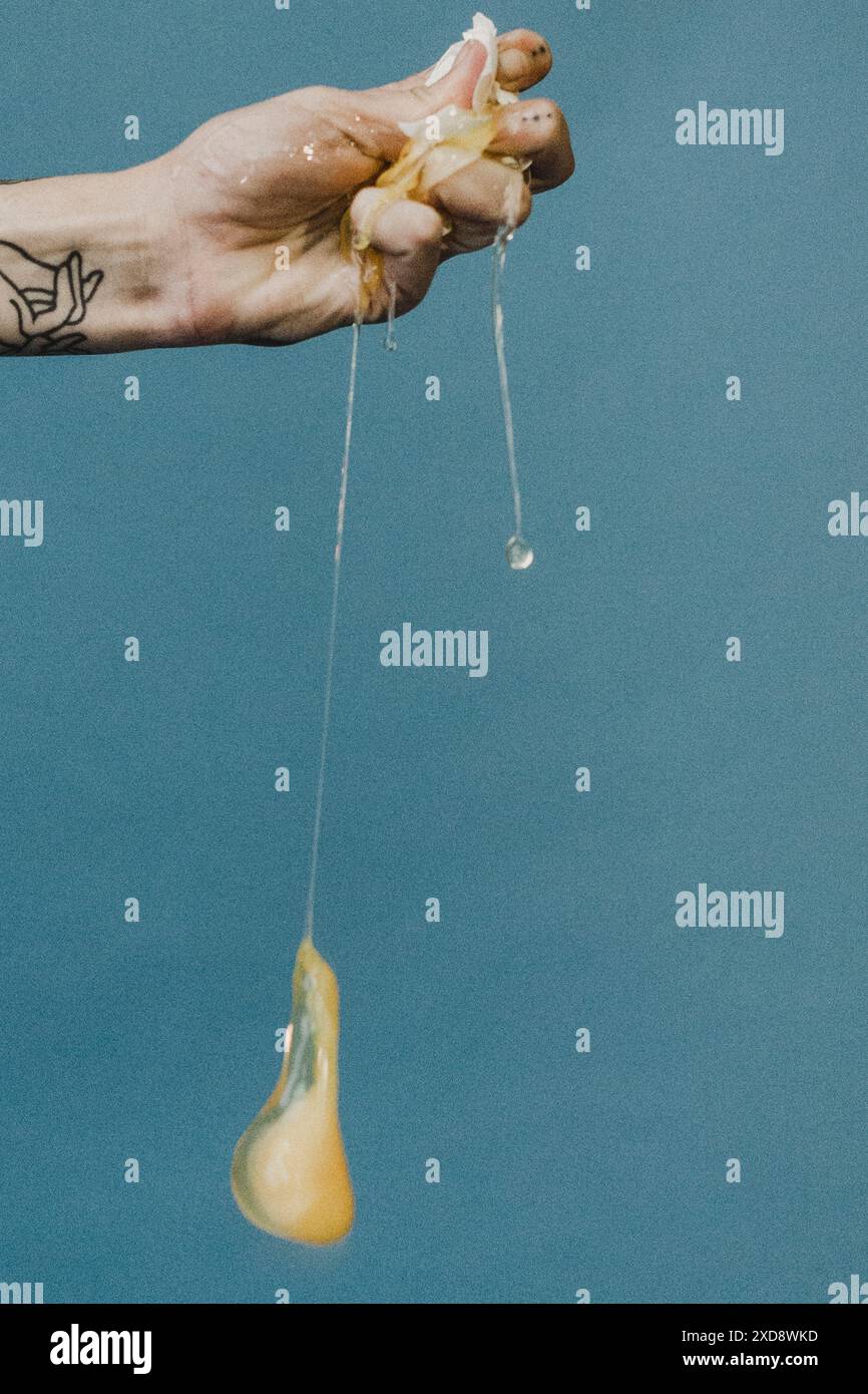 Raw egg dripping isolated hi-res stock photography and images - Alamy