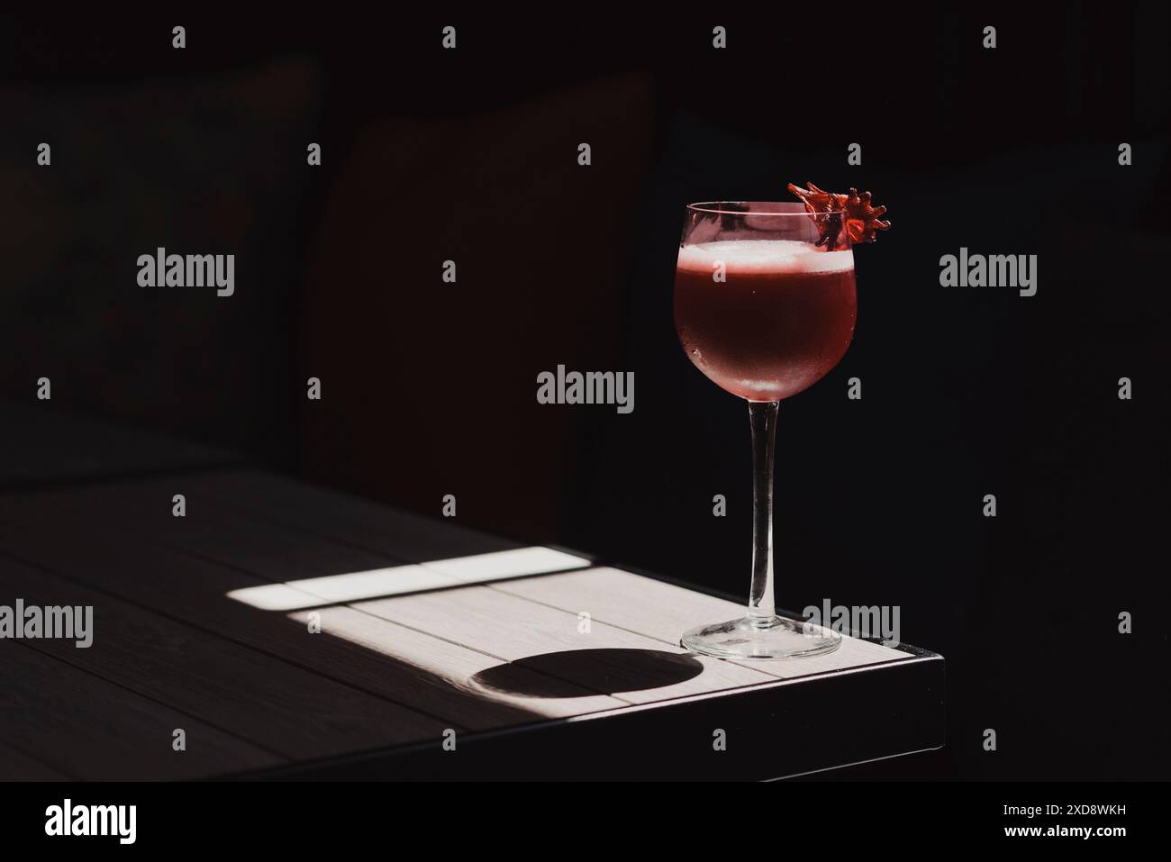 Moody red cocktail with space for text Stock Photo - Alamy