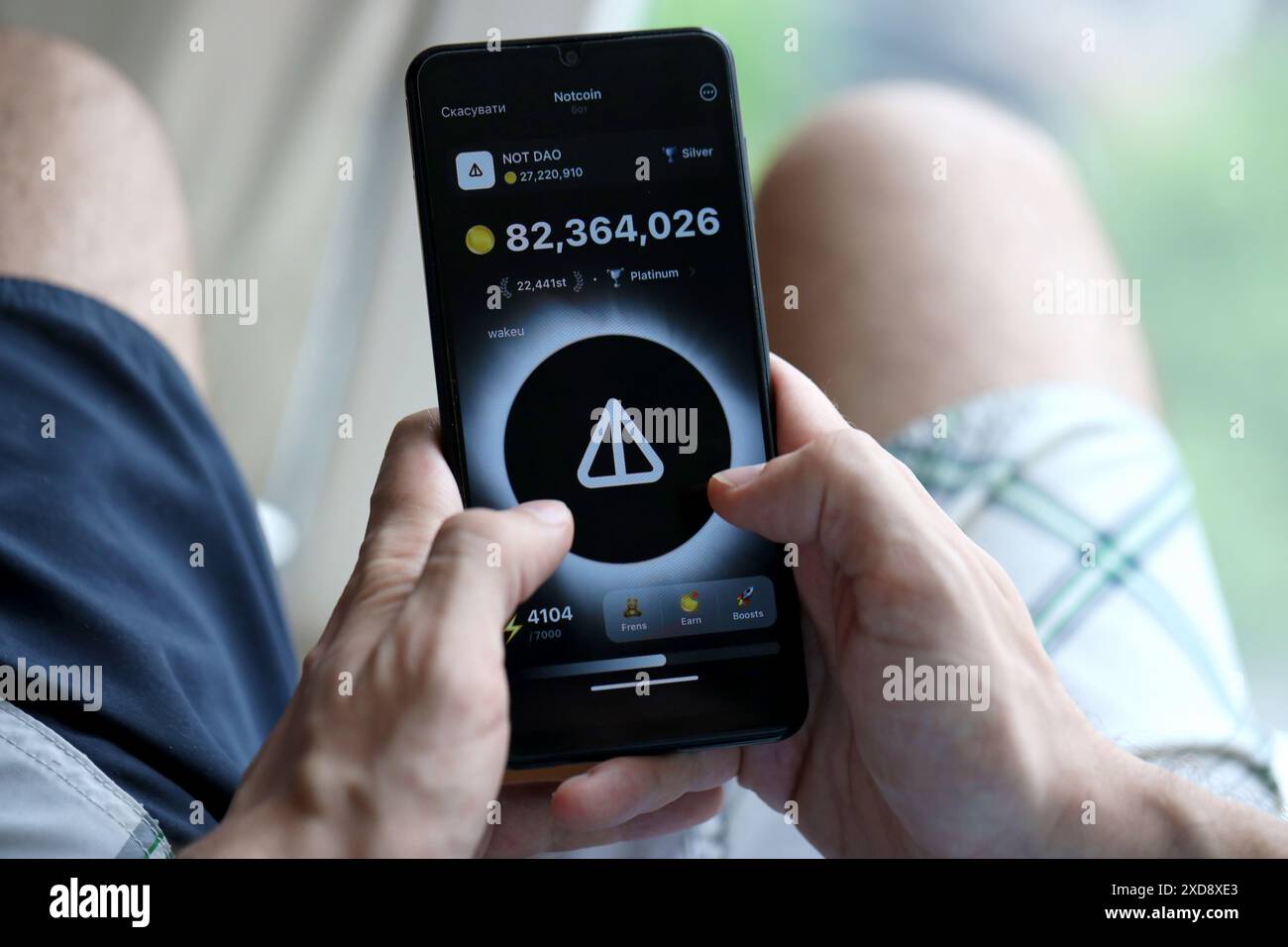 KYIV, UKRAINE - APRIL 20, 2024 Notcoin telegram bot on smartphone ...