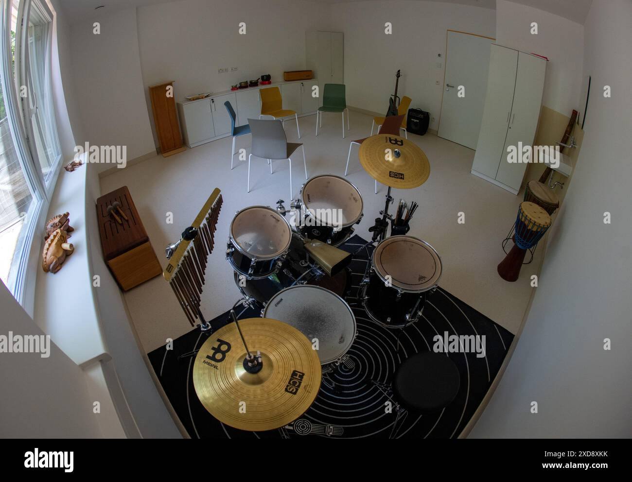Berlin, Germany. 20th June, 2024. Musical instruments stand and lie in ...